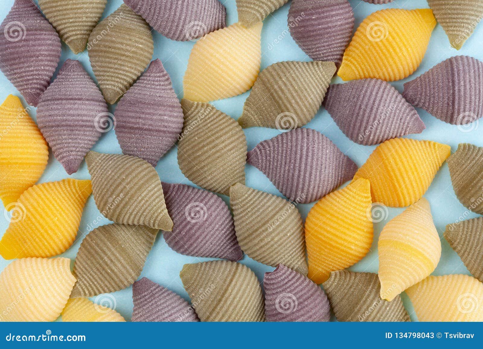 Top View Of Dry Conchiglie Pasta On Black Board Background. Three ...