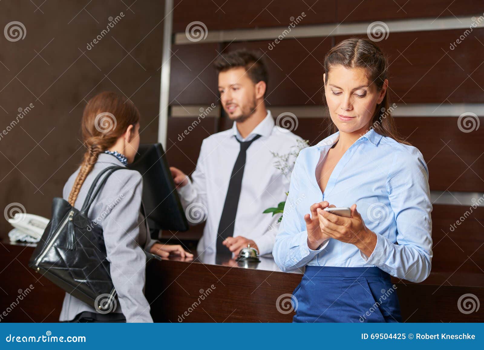 Concierge at Hotel Reception Serving Guests Stock Image - Image of ...