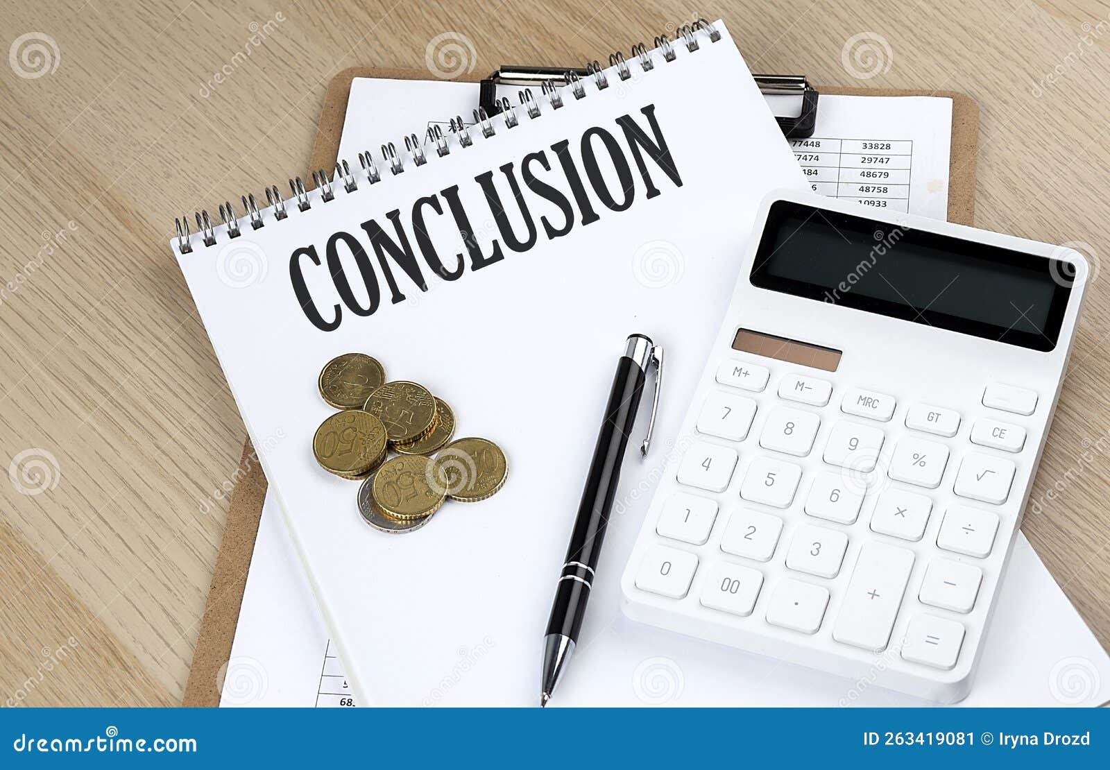 CONCLUSION Text on a Notebook with Chart and Calculator and Coins ...