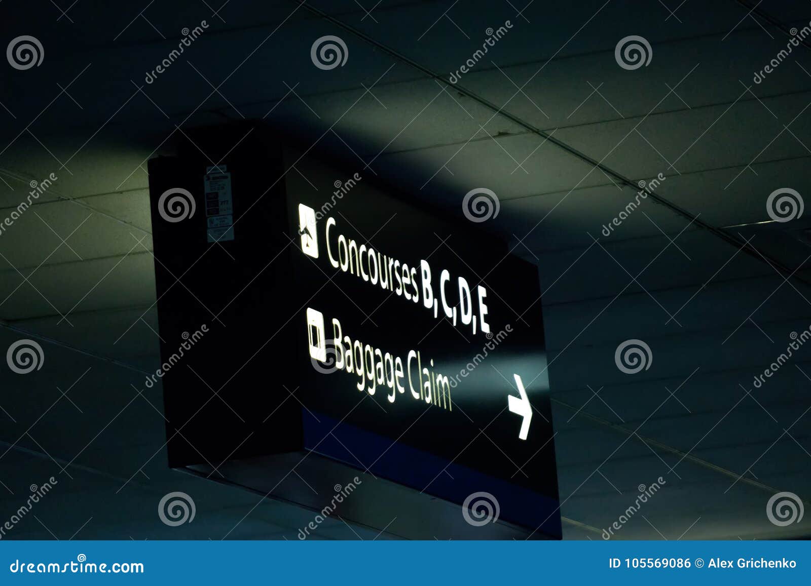 Concourse Sign and Directional Arrows at an Airport Stock Photo - Image ...