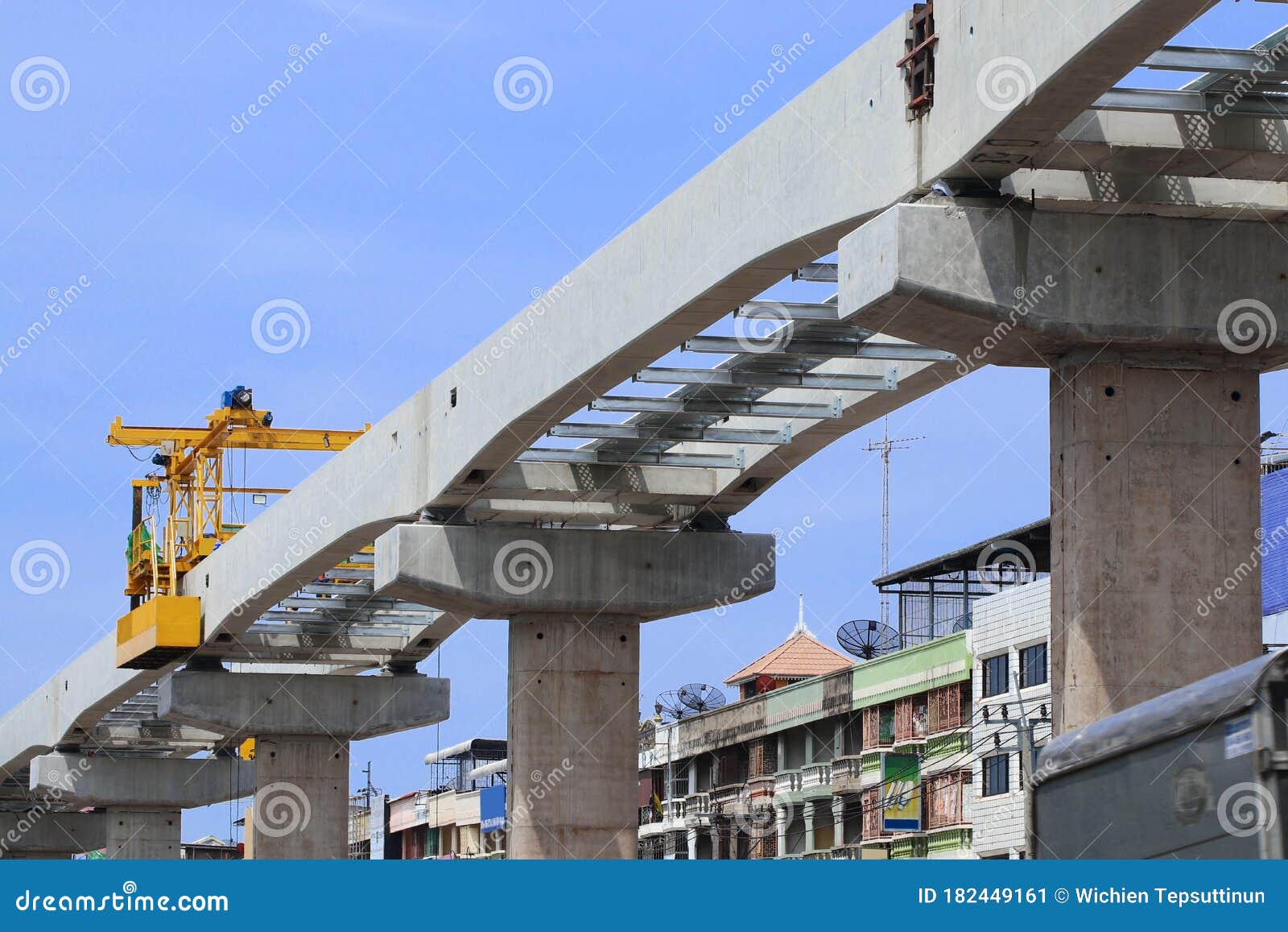 Mobile Hoist Machine Working On The Concrete Beams For Sky Train Under ...