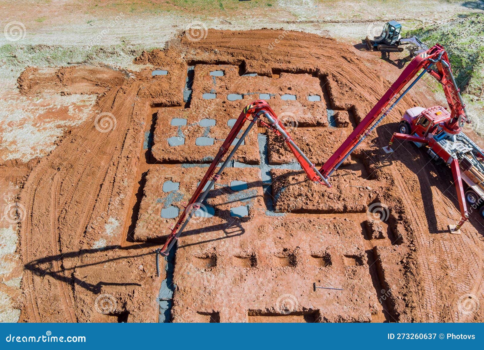 Concrete is Being Pumped into the Foundation of the House by a ...