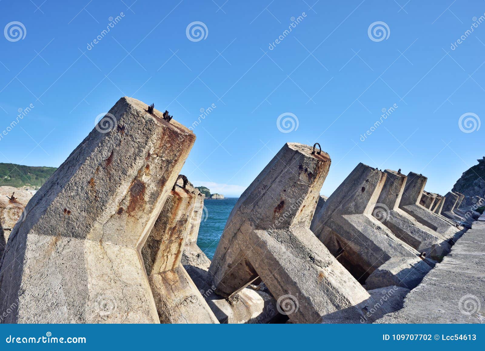 Concrete block breakwater stock photo. Image of ocean - 109707702