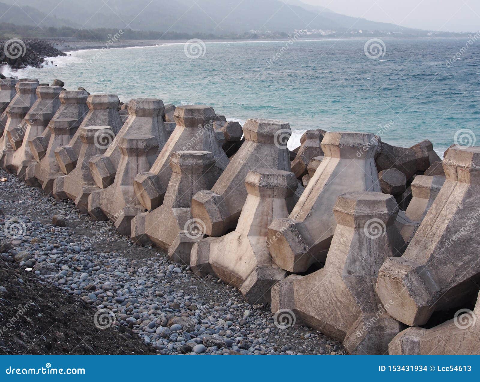 Concrete block breakwater stock photo. Image of pier - 153431934