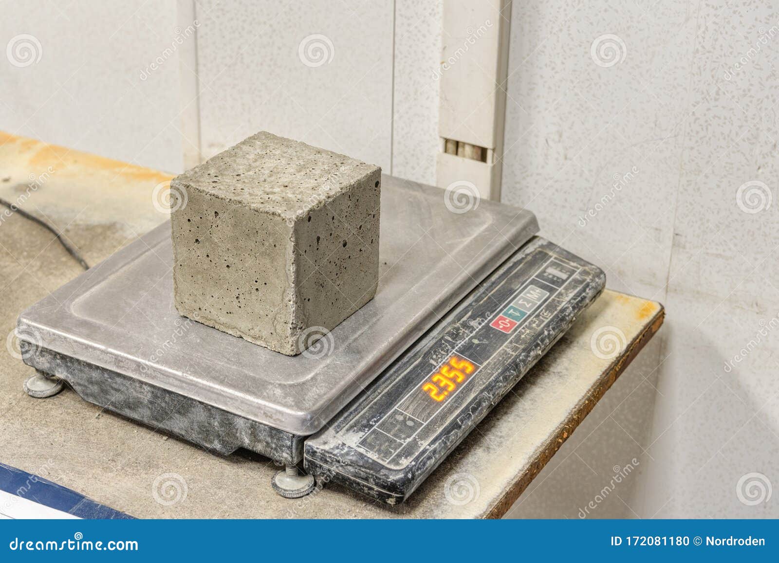 Concrete Block is Weighed on an Electronic Scale. Stock Photo - Image ...