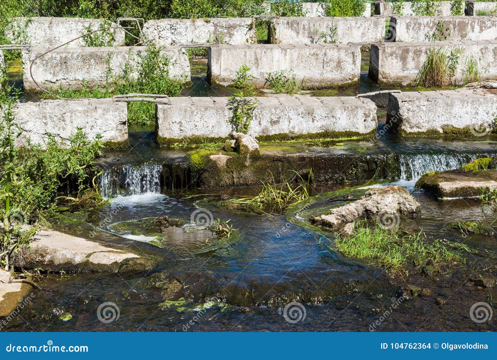 Concrete Blocks Lying on a Small River - Dam Stock Photo - Image of ...