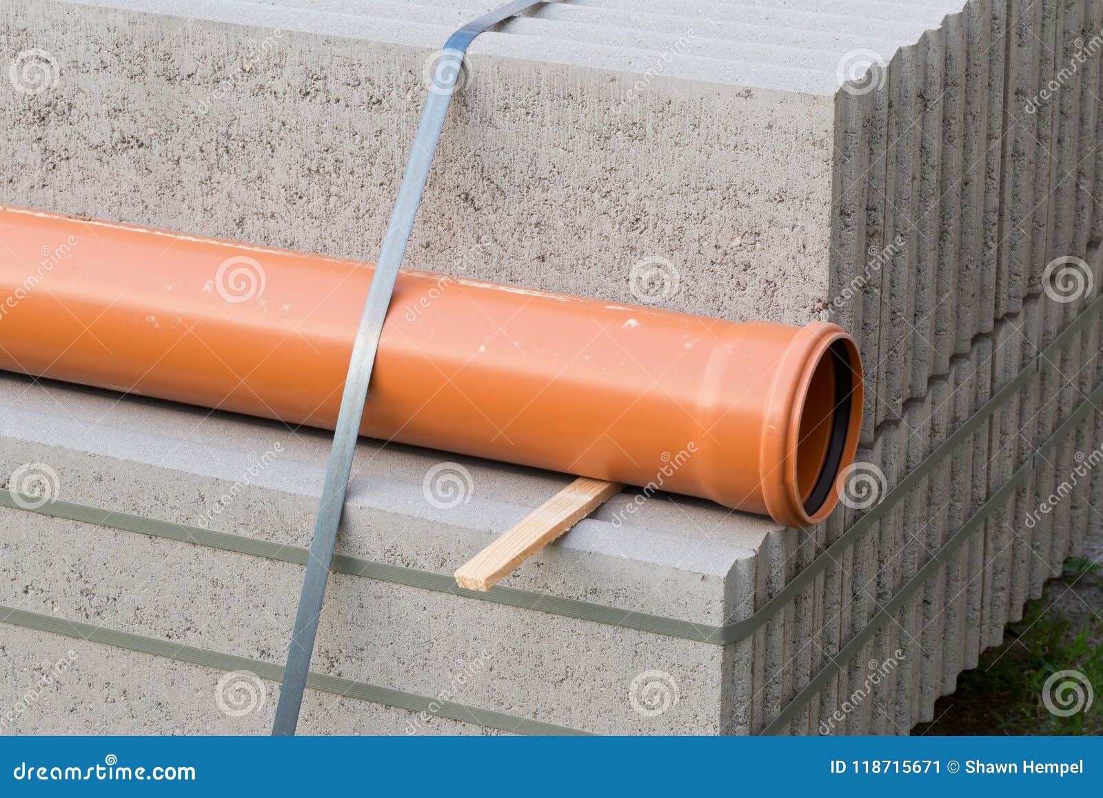 Concrete Blocks and Plastic Pvc Sewage Pipe on Palette on Construction ...