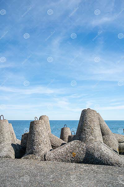 Concrete Breakwater on the End of Pier. Stock Photo - Image of vacation ...