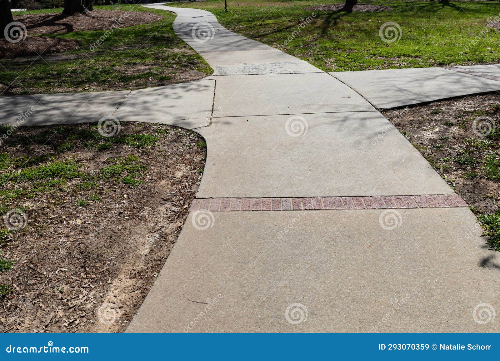 Concrete and Brick Paths Intersect and Go Off in 4 Directions, Choice ...