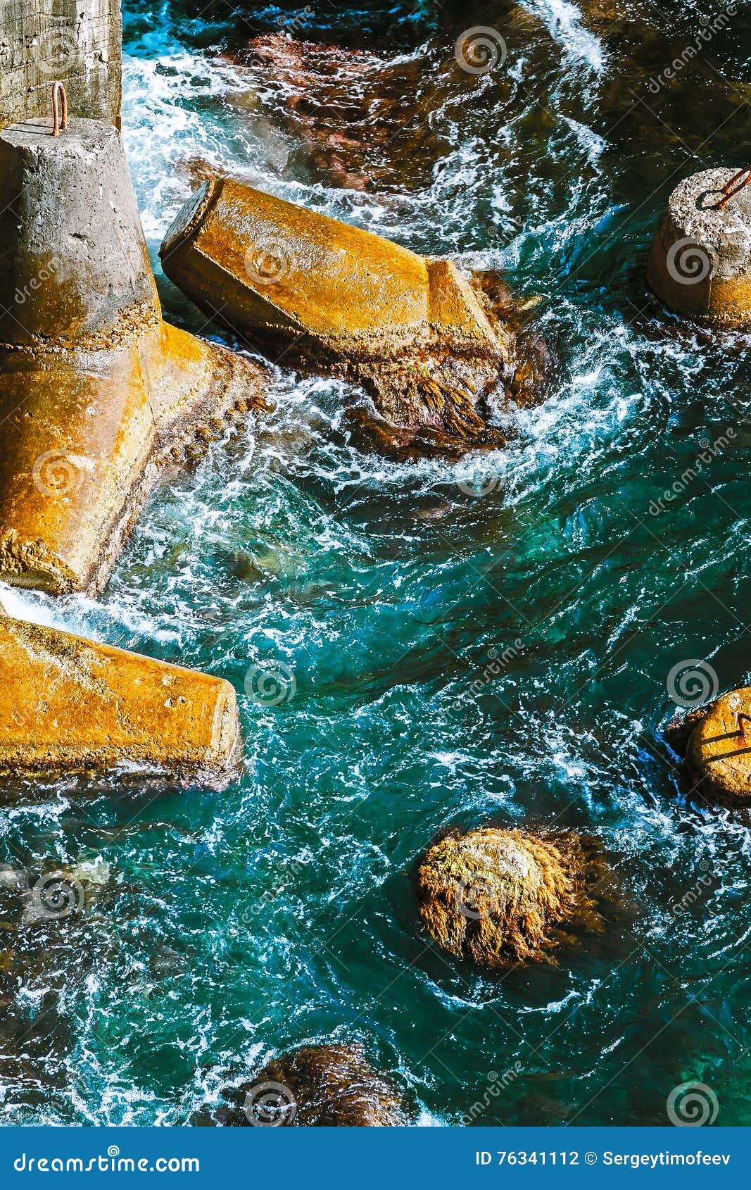 A concrete buoy in the sea stock photo. Image of orange - 76341112