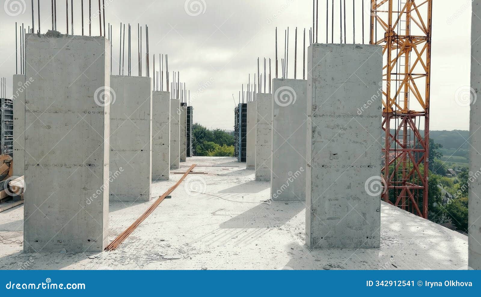 Concrete Columns in a Building Under Construction. Rows of Tall ...