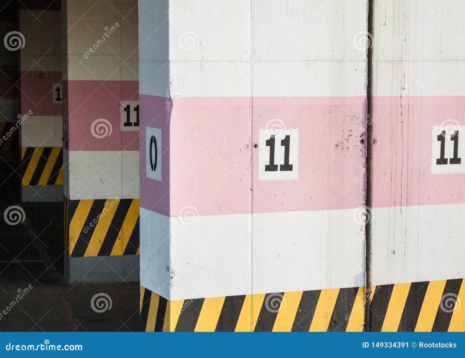Concrete Columns with Numbers Stock Image - Image of elevated, paint ...