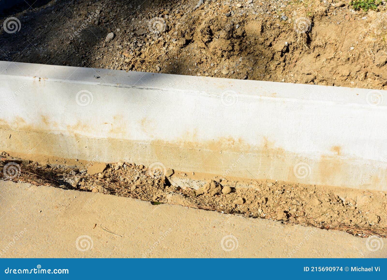 Concrete Curb Construction in Progress. Excavated Area Stock Photo ...