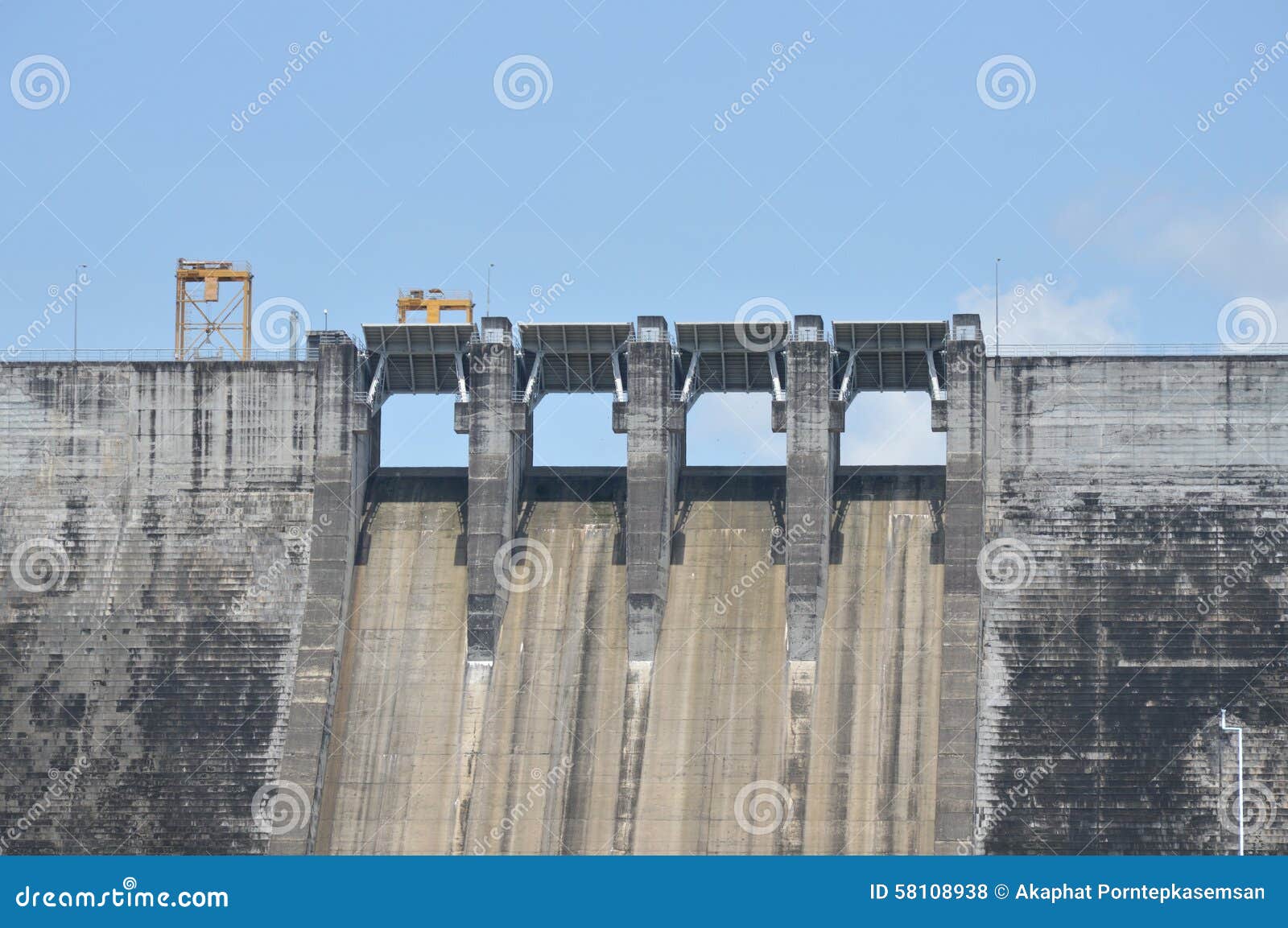 Concrete dam on sunny day stock photo. Image of brick - 58108938