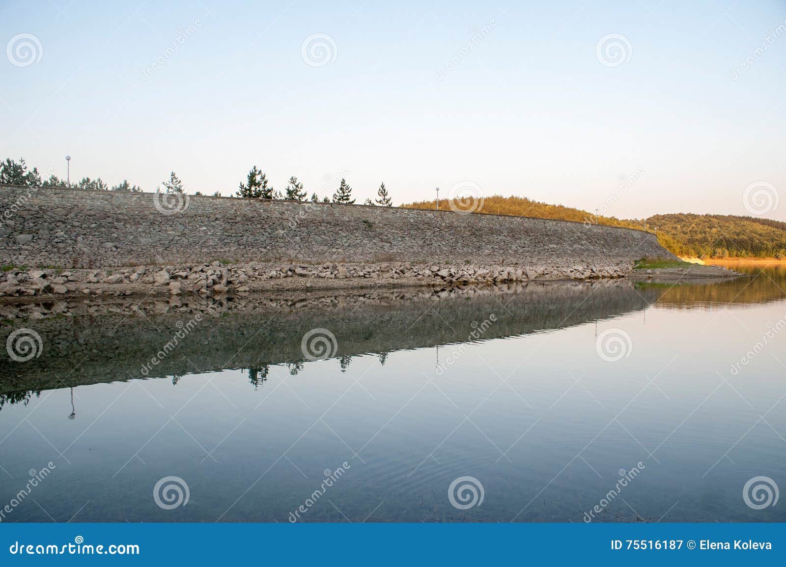 Concrete dam wall on water stock image. Image of exterior - 75516187