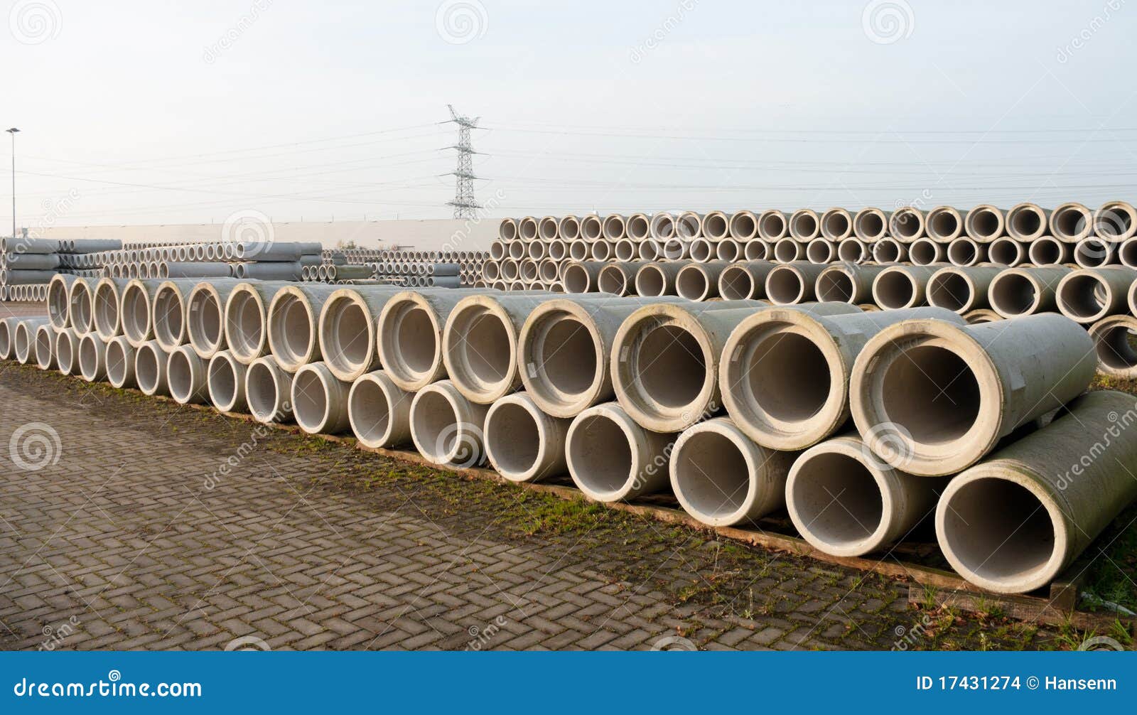 Concrete Drainage Pipes Stacked For Construction, Irrigation, In Stock ...