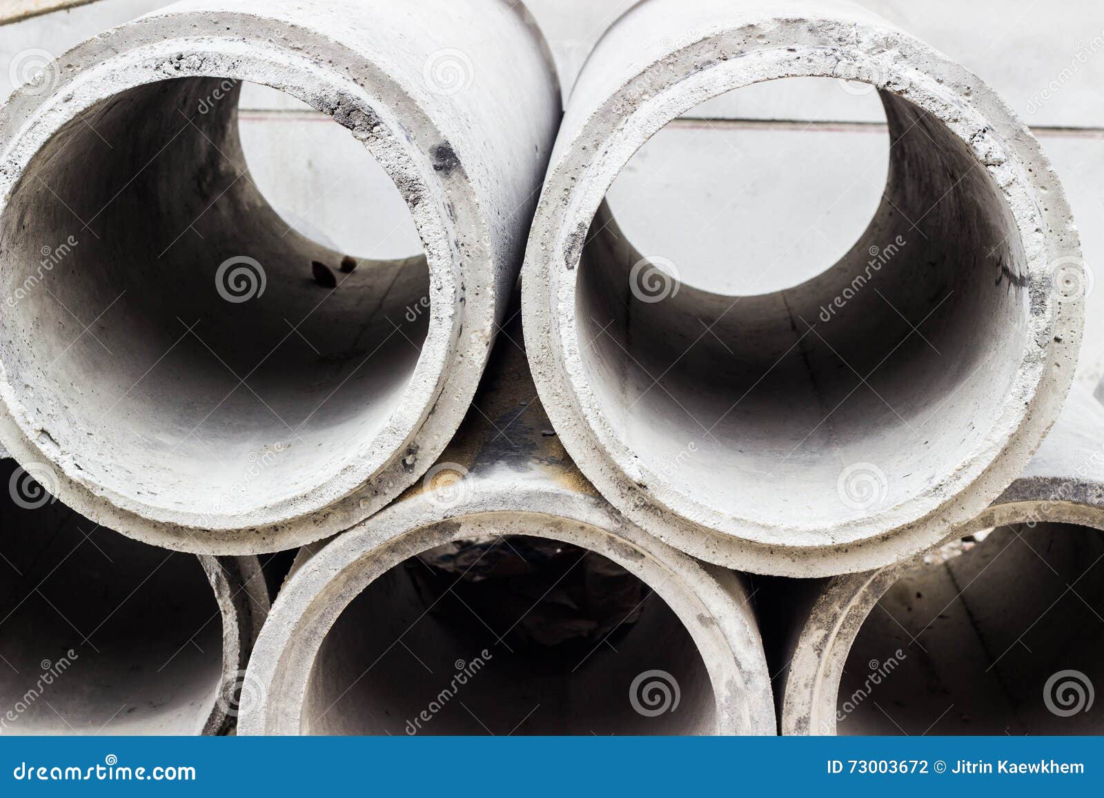 Concrete drainage pipes stock photo. Image of pile, identical - 73003672