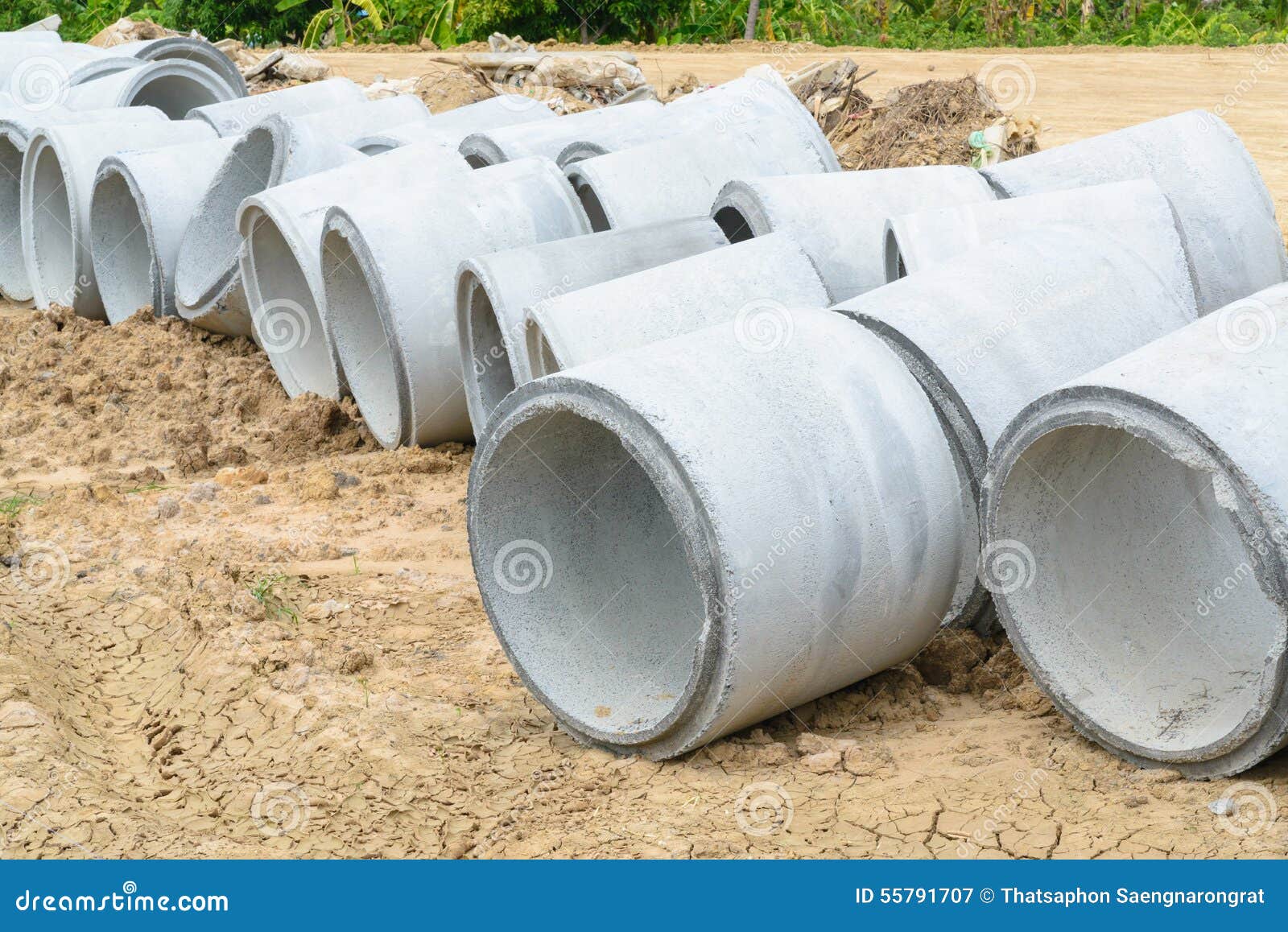 Concrete Drainage Pipes Stacked For Construction, Irrigation, In ...