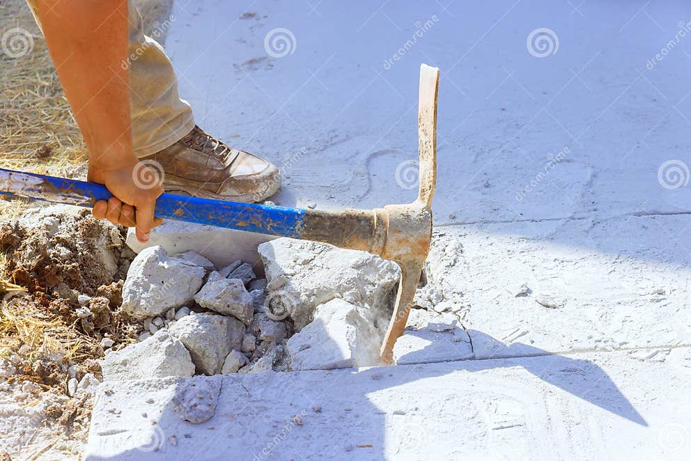Concrete Old Driveway Demolition by Worker Using Pickaxe at ...