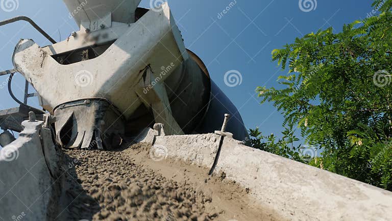 Concrete Flows from the Concrete Mixer through the Trough, Concrete ...