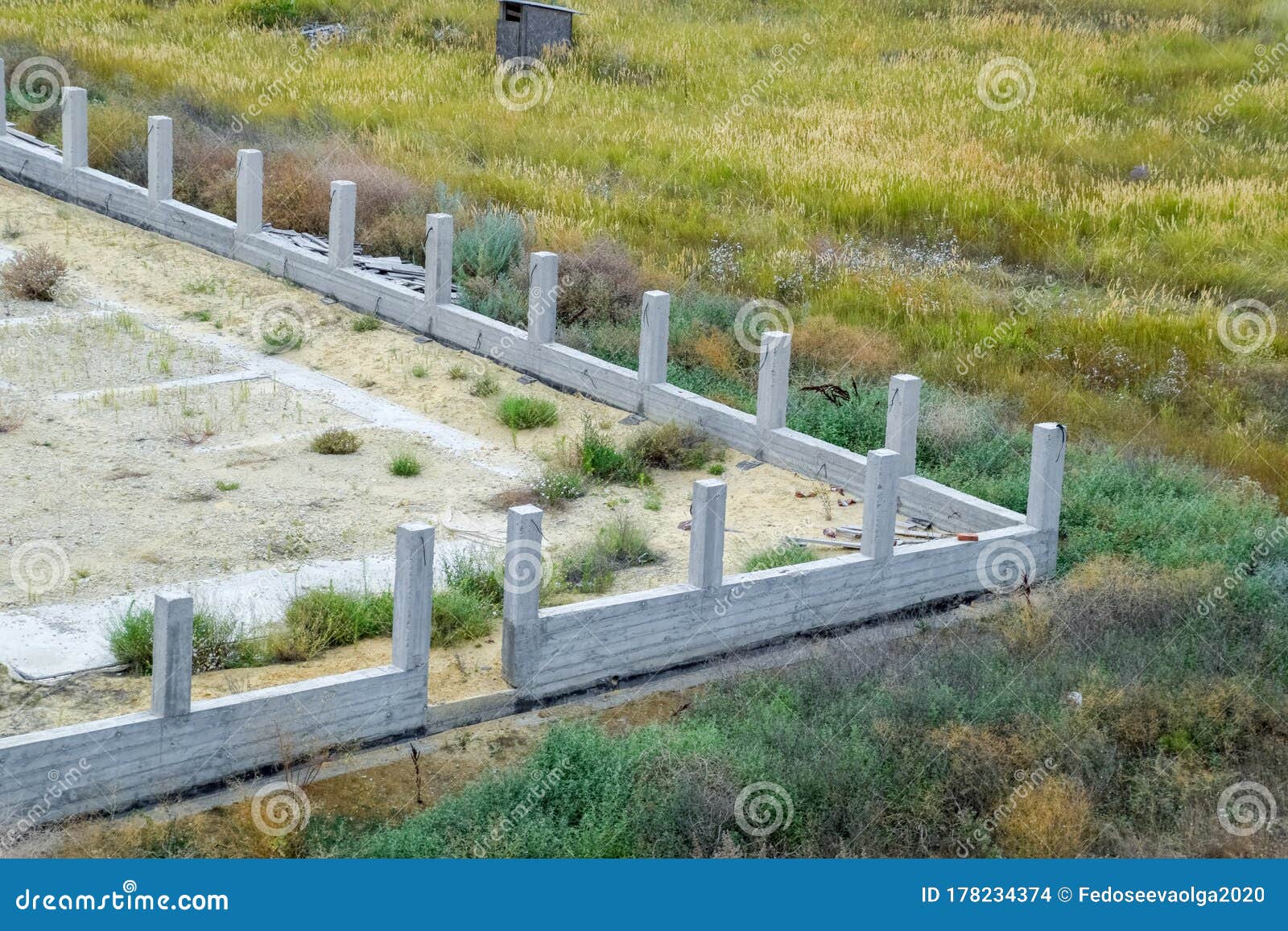Concrete Foundation of the Future Fence. Concrete Fence Stock Photo ...