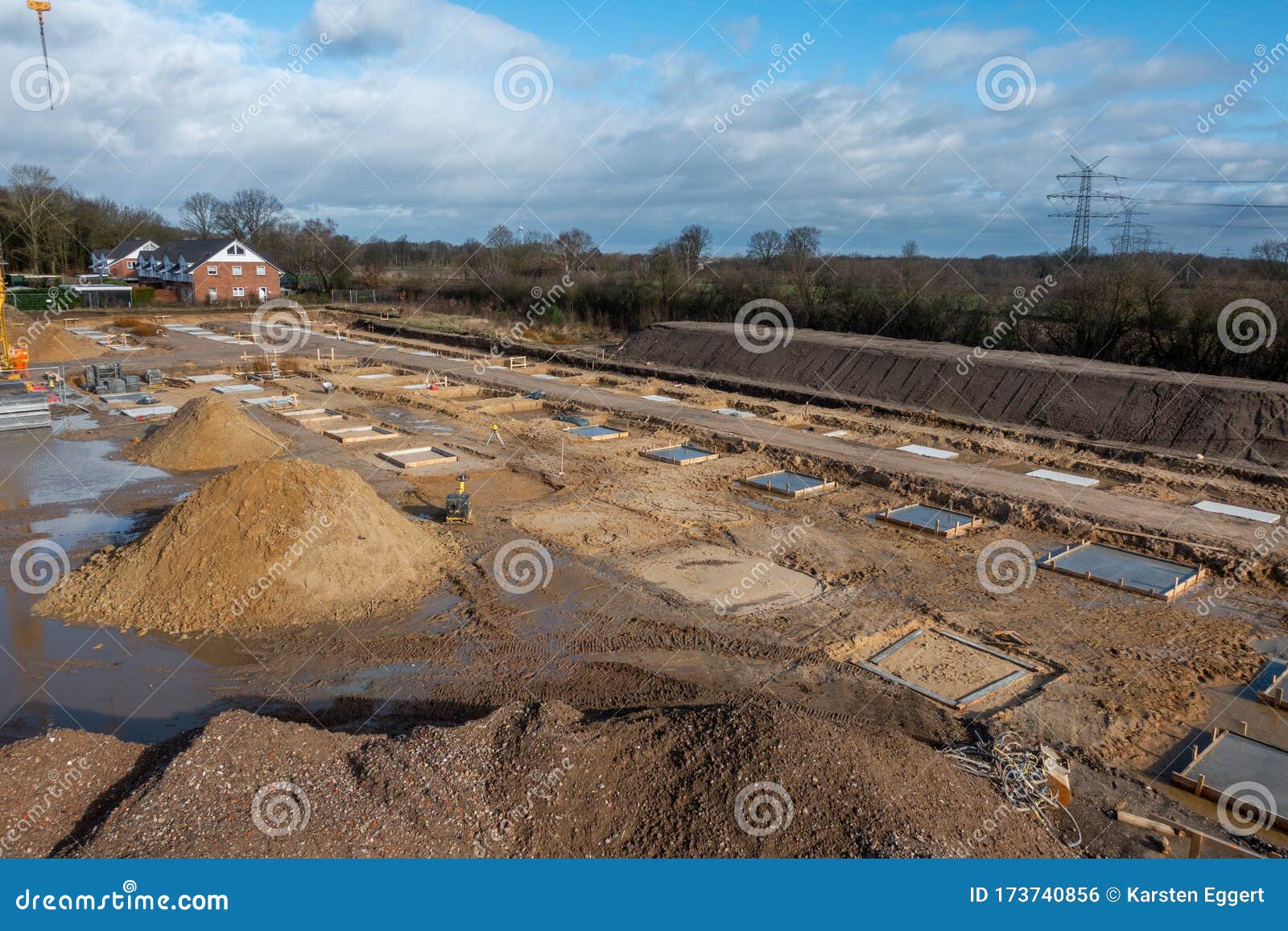 Concrete Foundations for the Columns of a Factory Building are Poured ...