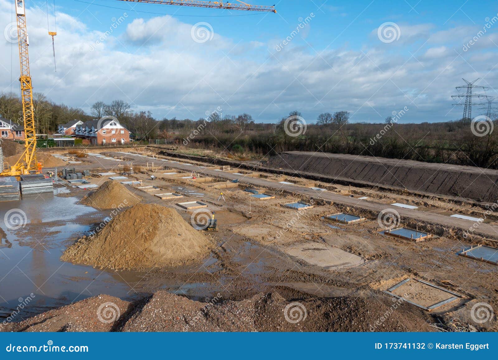 Concrete Foundations for the Columns of a Factory Building are Poured ...