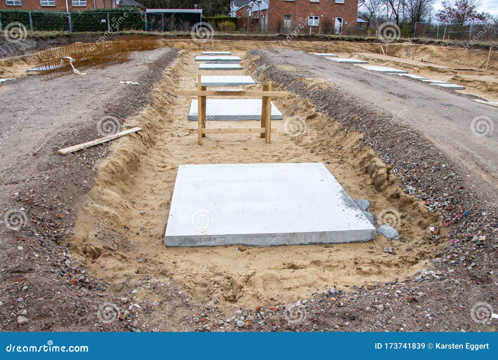 Concrete Foundations for the Columns of a Factory Building are Poured ...