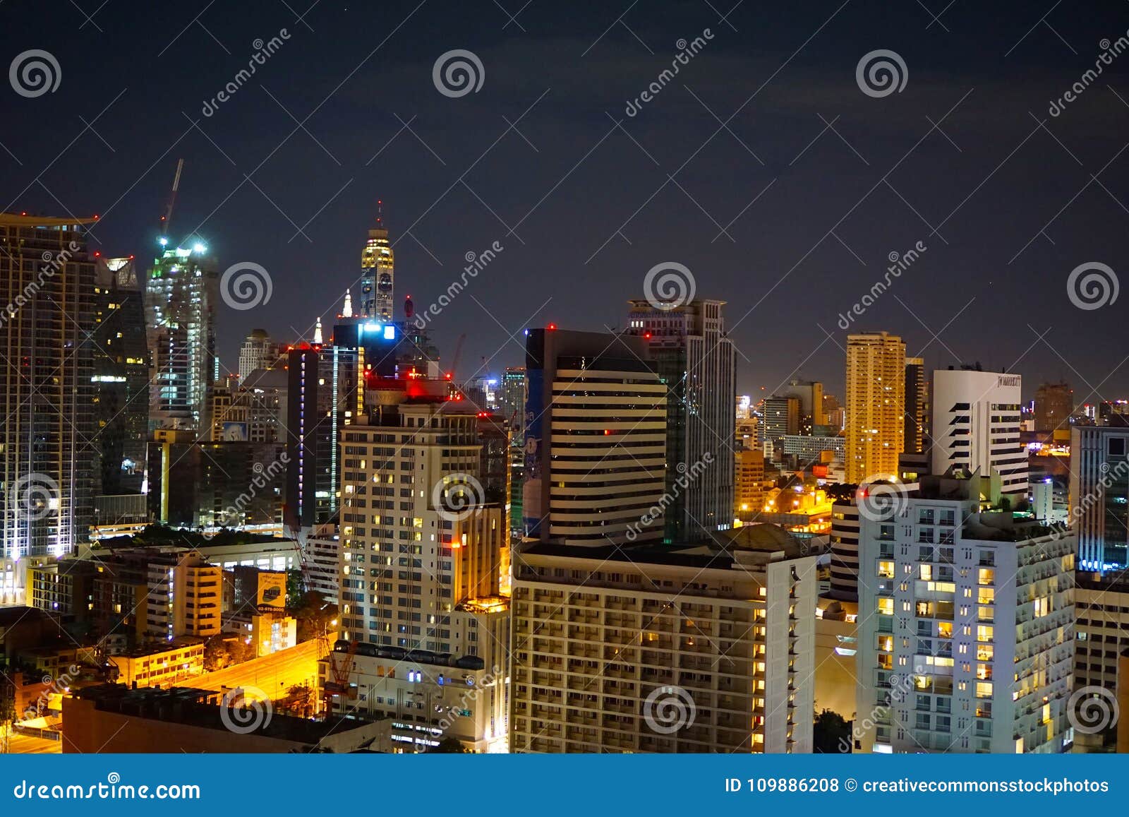 Concrete High Rise Building During Night Time Picture. Image: 109886208