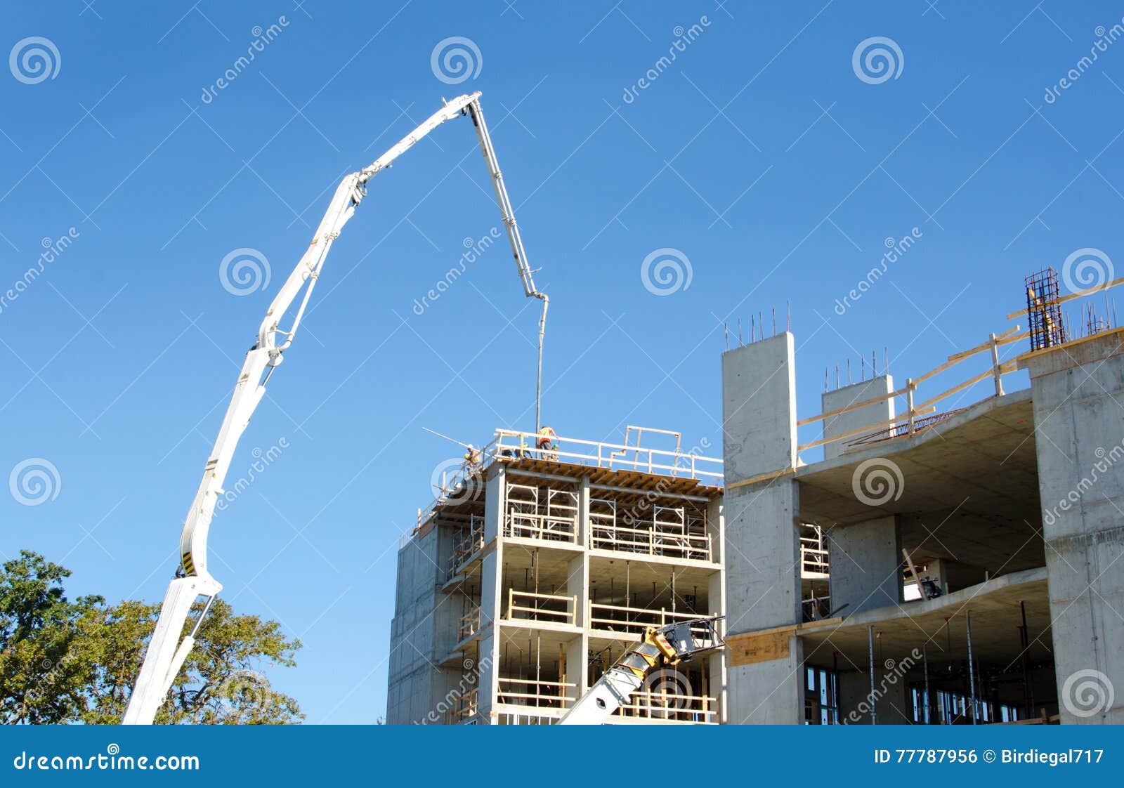 Concrete Highrise Construction Site, Concrete Pumper with Raised Boom ...