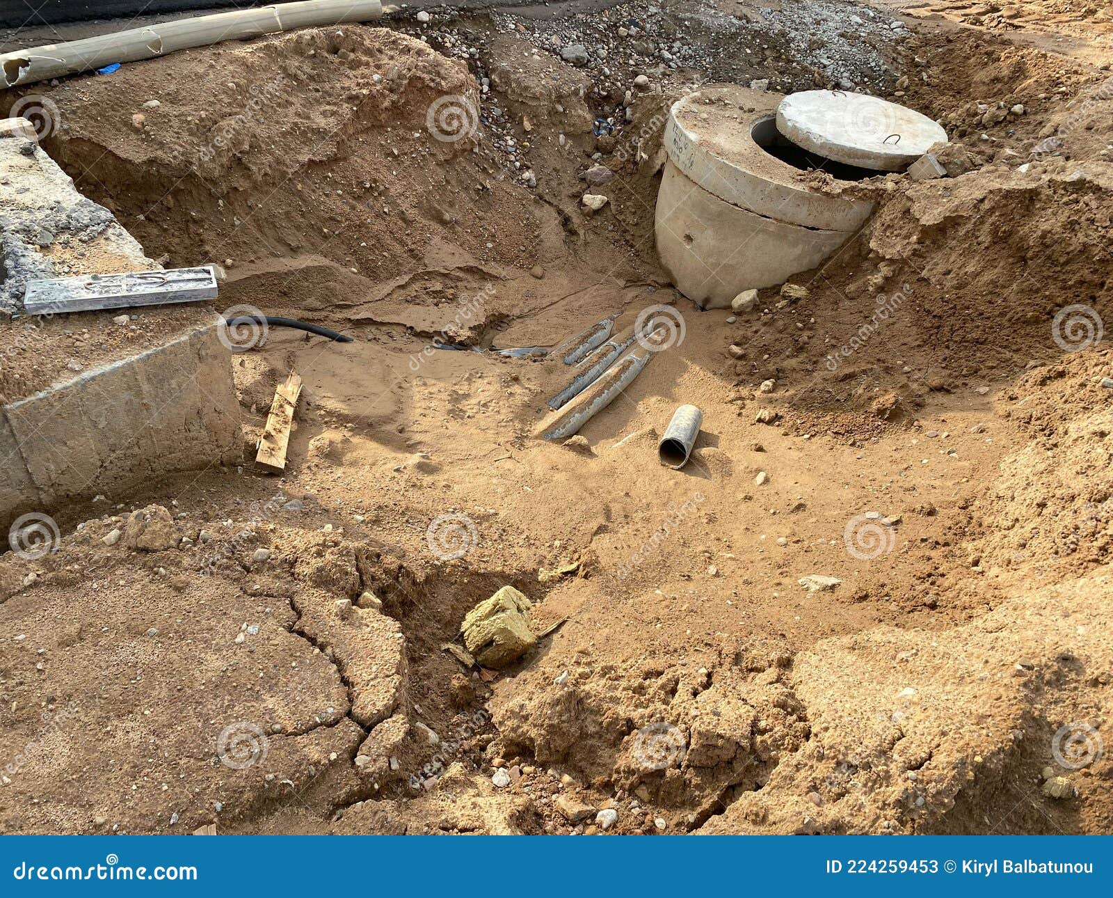 Concrete Manhole in a Pit at a Construction Site. Industrial ...