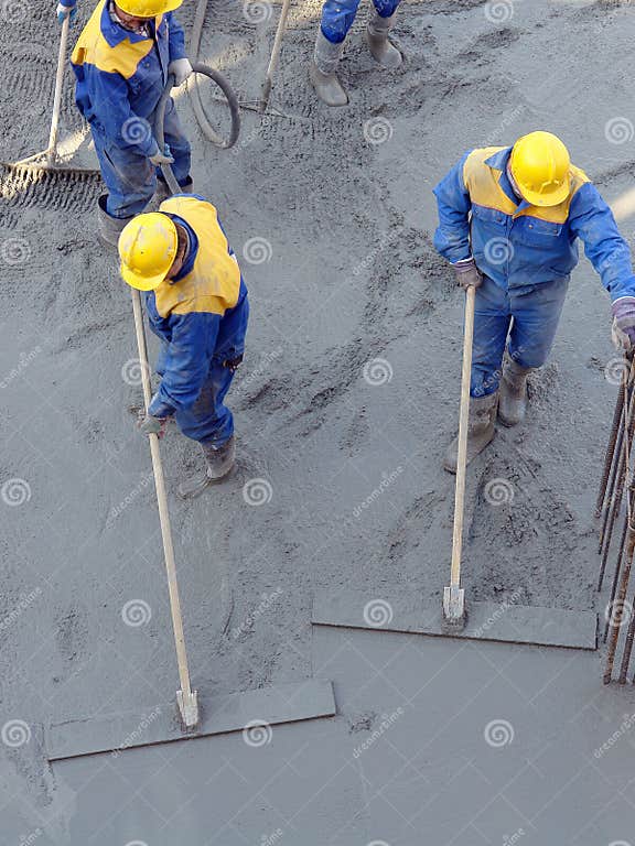 Concrete mix spreading stock photo. Image of construction - 2225416