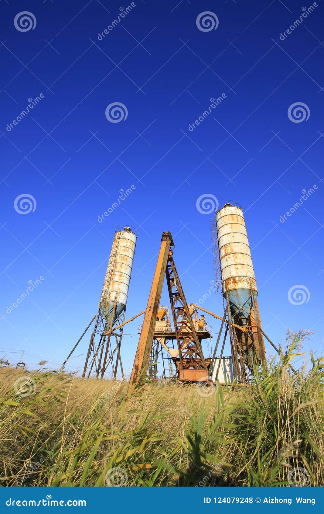 Concrete mixing tower. stock photo. Image of industrial - 124079248