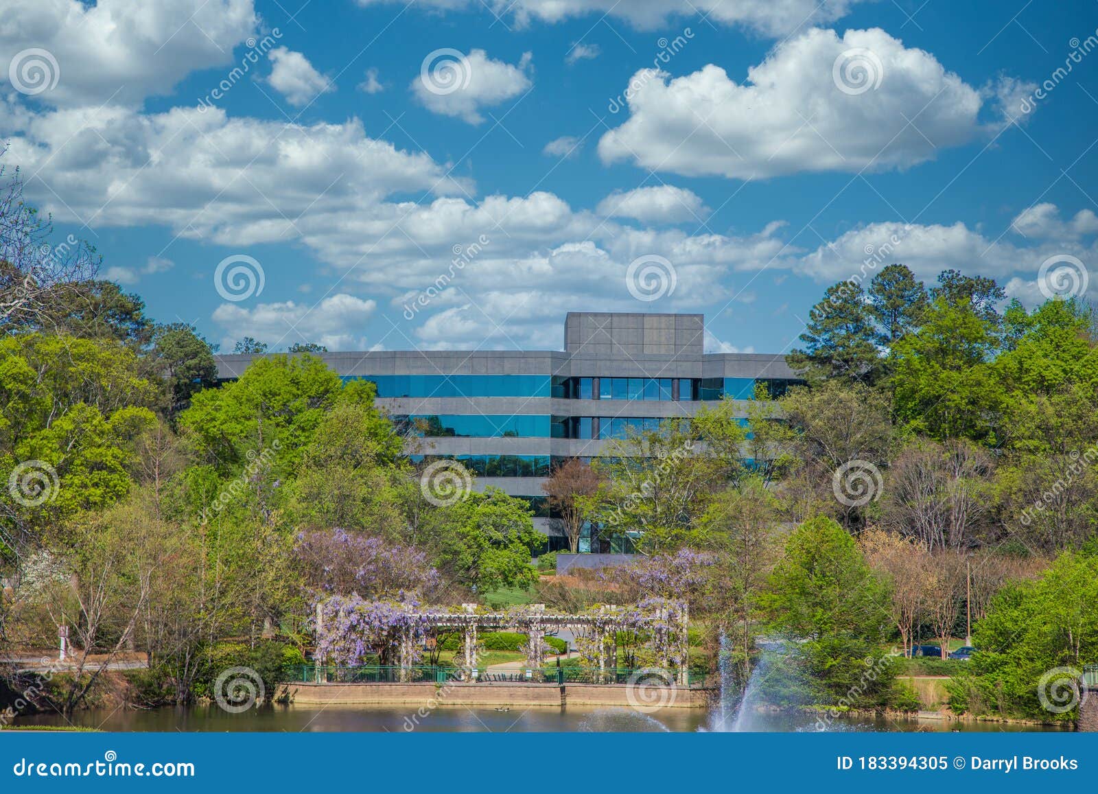 Concrete Office Building in Spring Stock Image - Image of glass, green ...
