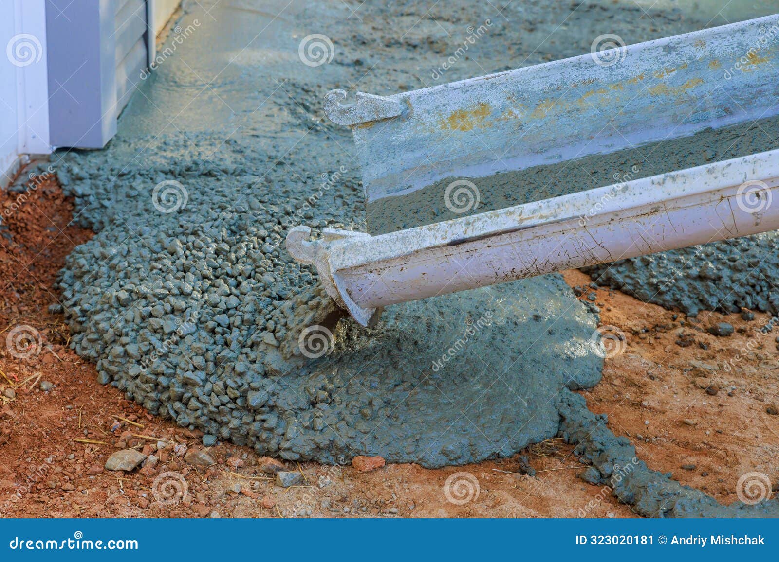 Concrete Parking Lot is Prepared by Pouring a Concrete Foundation Stock ...