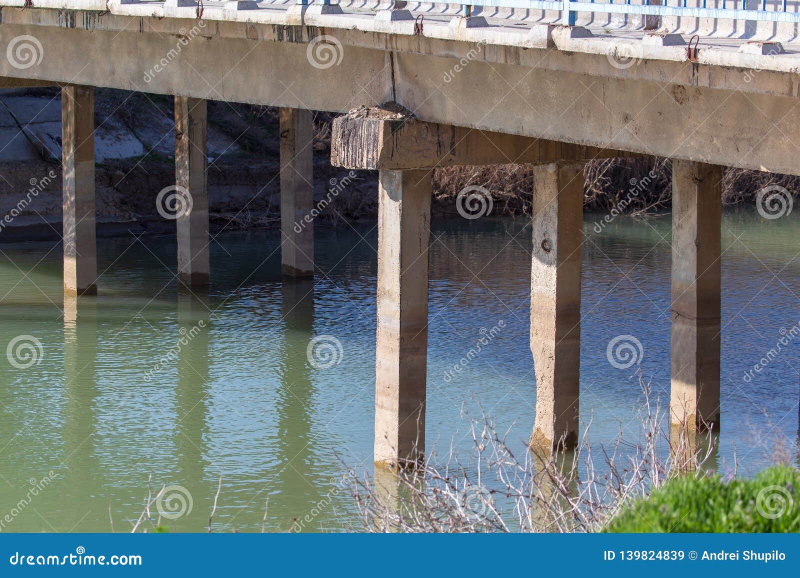 Concrete Piles on a Bridge Over the River Stock Image - Image of bridge ...