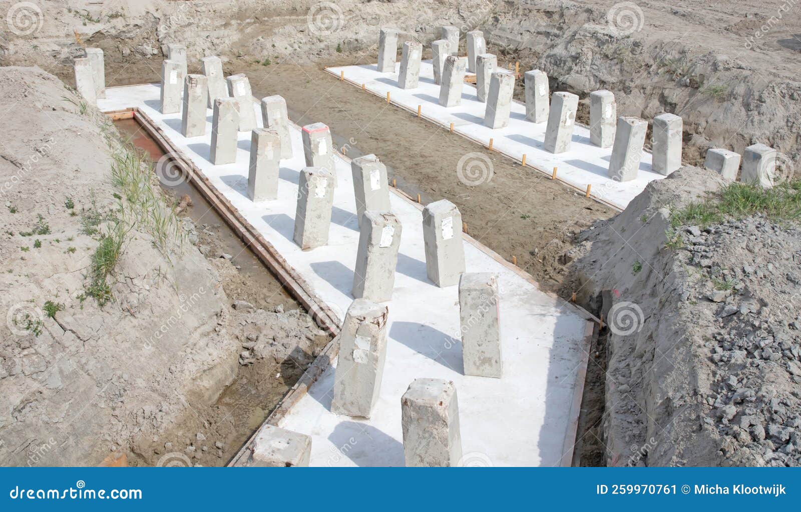 Concrete Piles Foundation for a New Building on Construction Site Stock ...