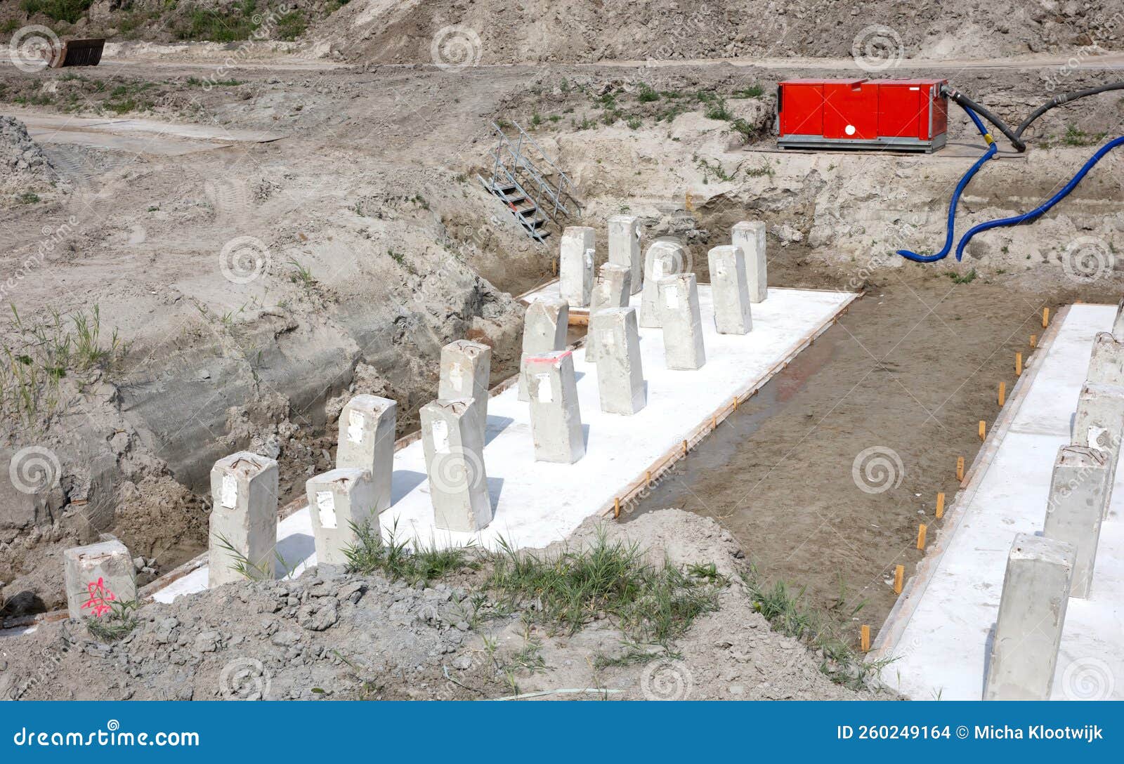 Concrete Piles Foundation for a New Building on Construction Site Stock ...
