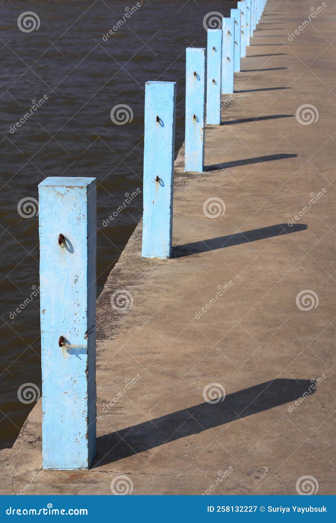 Concrete Pole with Chains Hooks on Jetty, Blue Jetty Pole, Blue ...