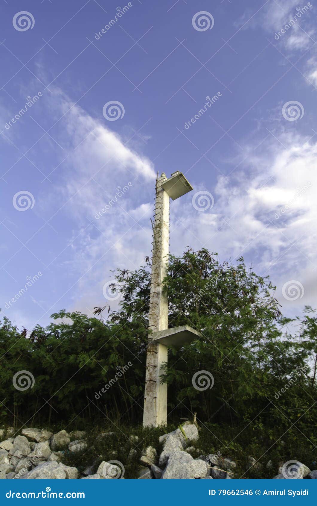 Concrete port light tower stock photo. Image of tall - 79662546