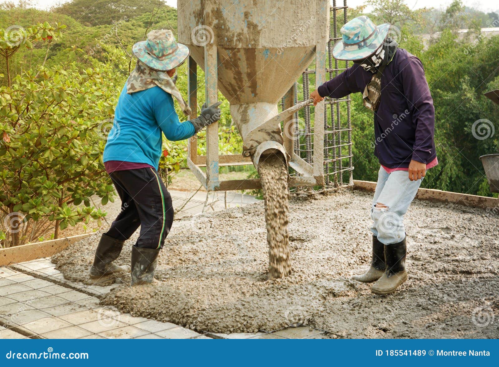 Workers Pouring Concrete for the Bases of the Building Floors. Concrete ...