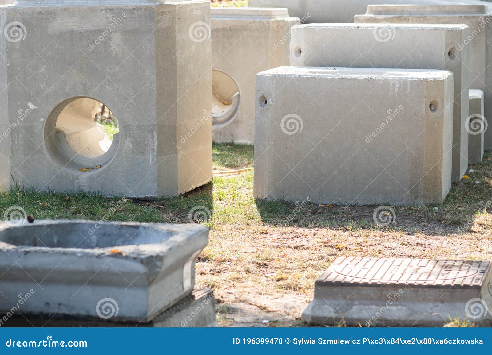 Concrete Prefabric Elements Lying on the Ground, Ready for Sewerage ...