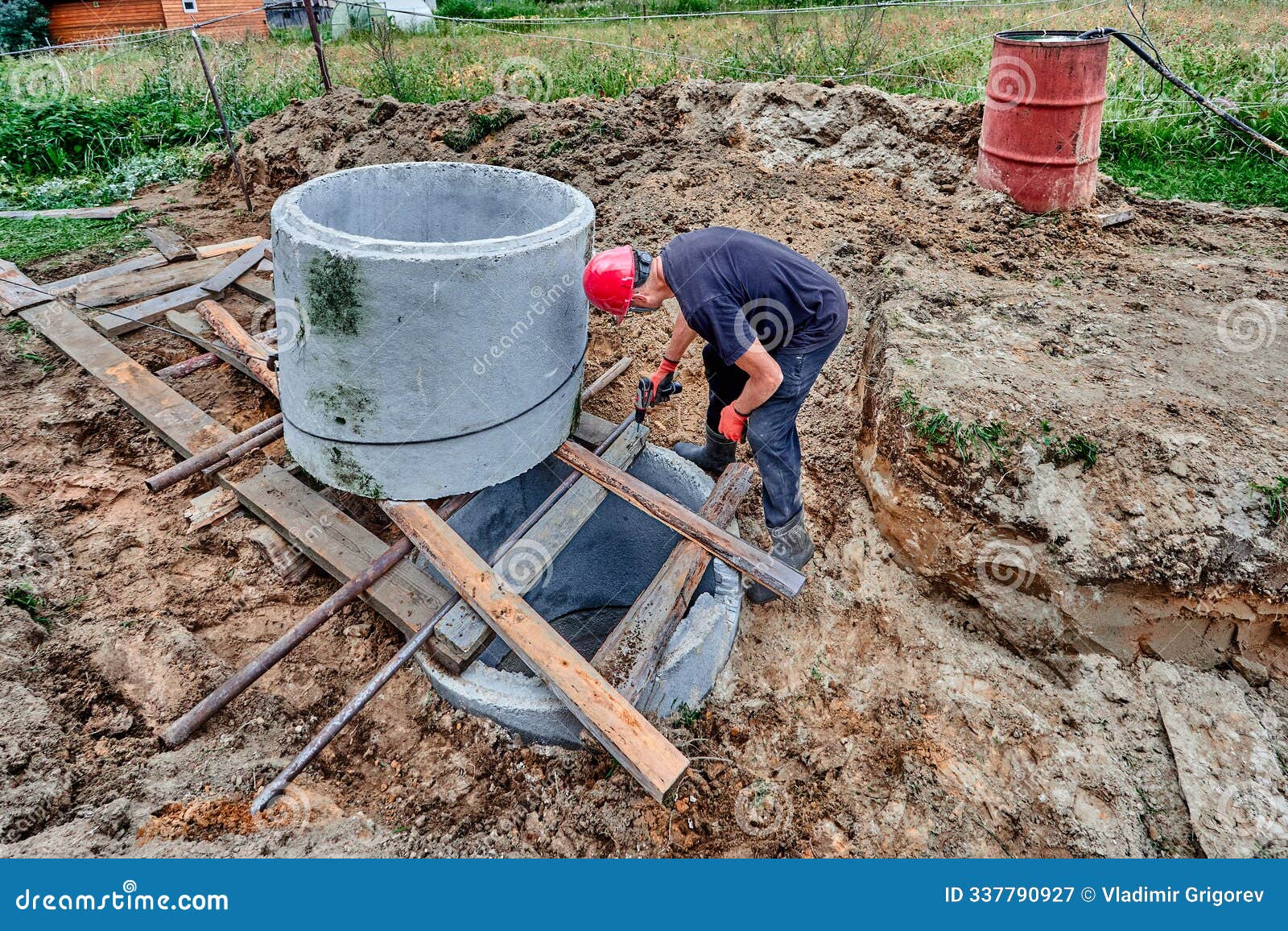 Installation Of Septic Tank Made Of Concrete Rings For Suburban ...