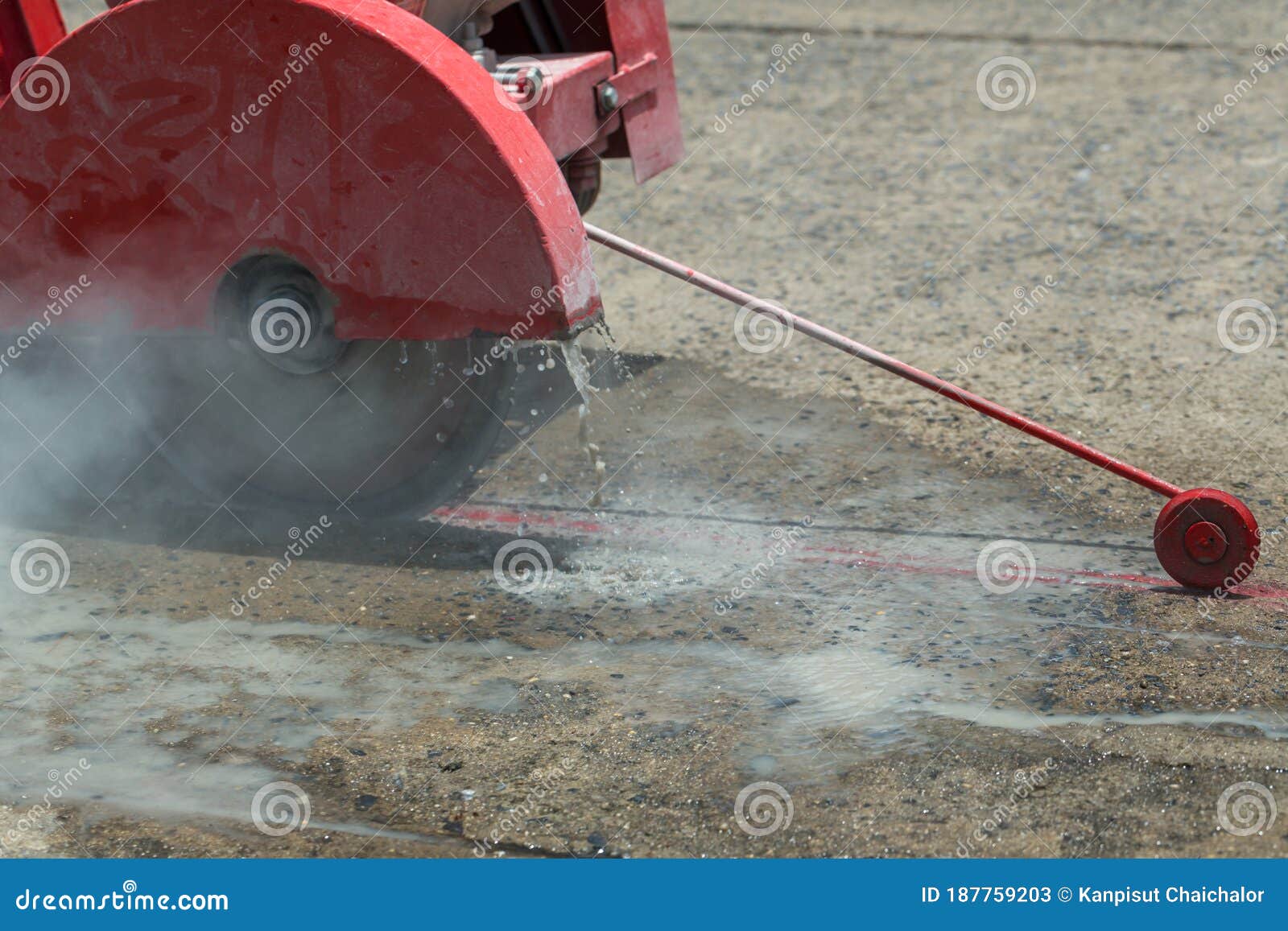 Concrete Road Cutters with Worker. Worker Using Diamond Saw Blade ...
