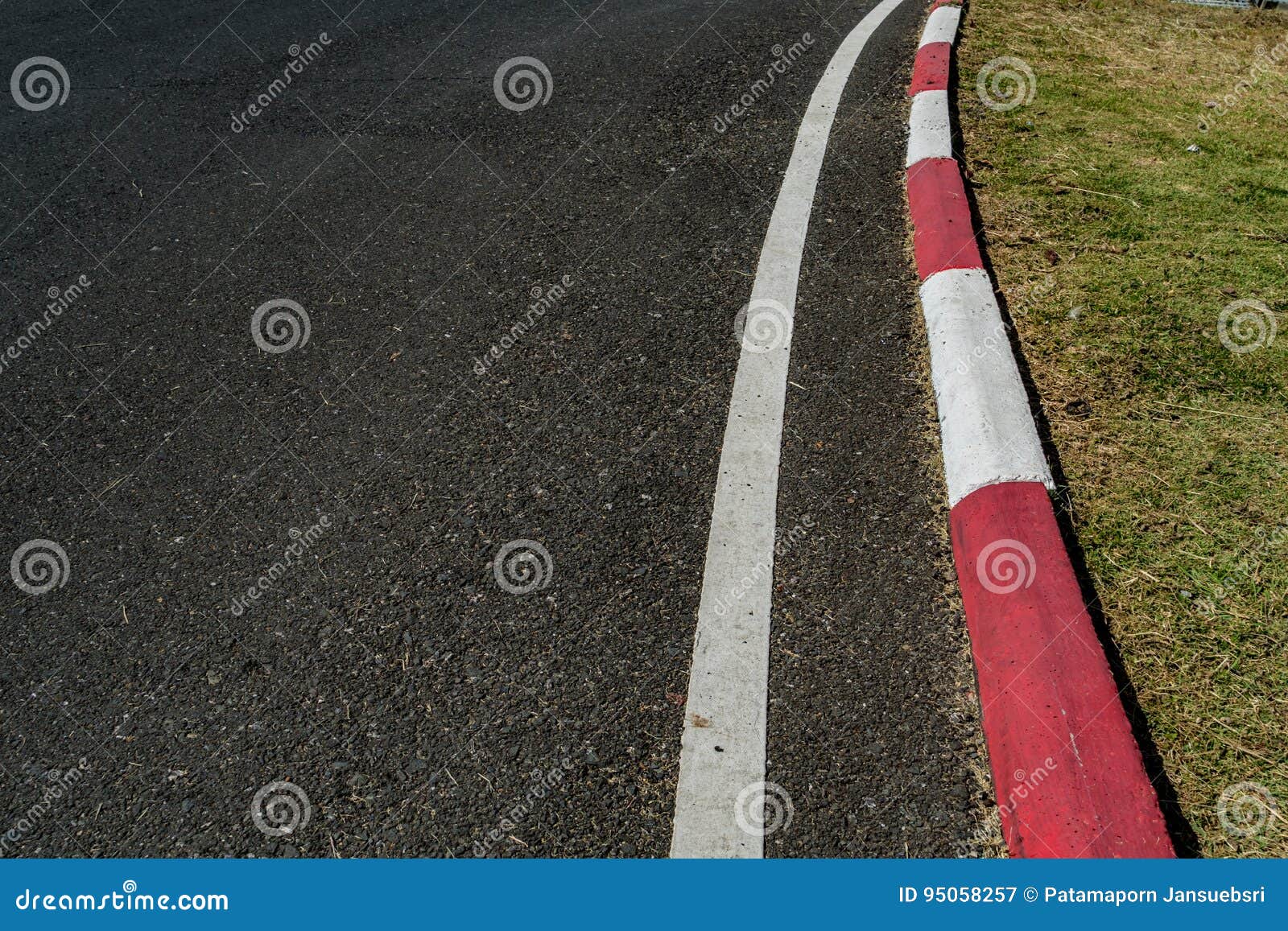 Concrete Road with Red and White Stock Image - Image of parking, path ...