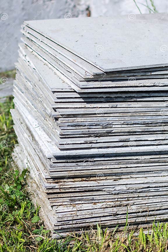 Concrete Sheets are Piled Up on the Grassy Ground Stock Image - Image ...