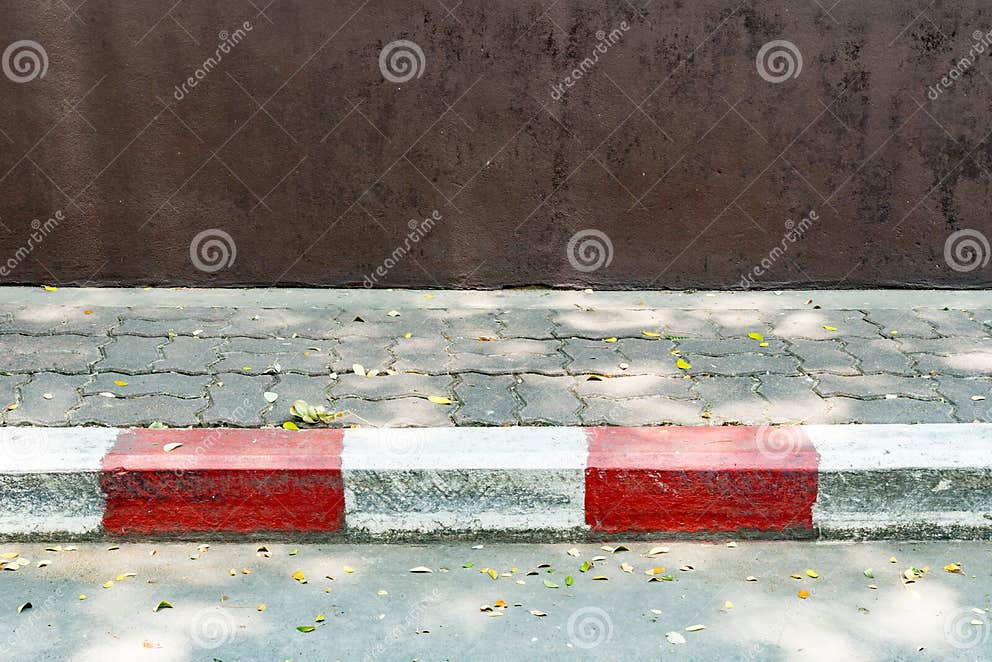 Concrete Sidewalk with Red and White Stock Photo - Image of line, white ...