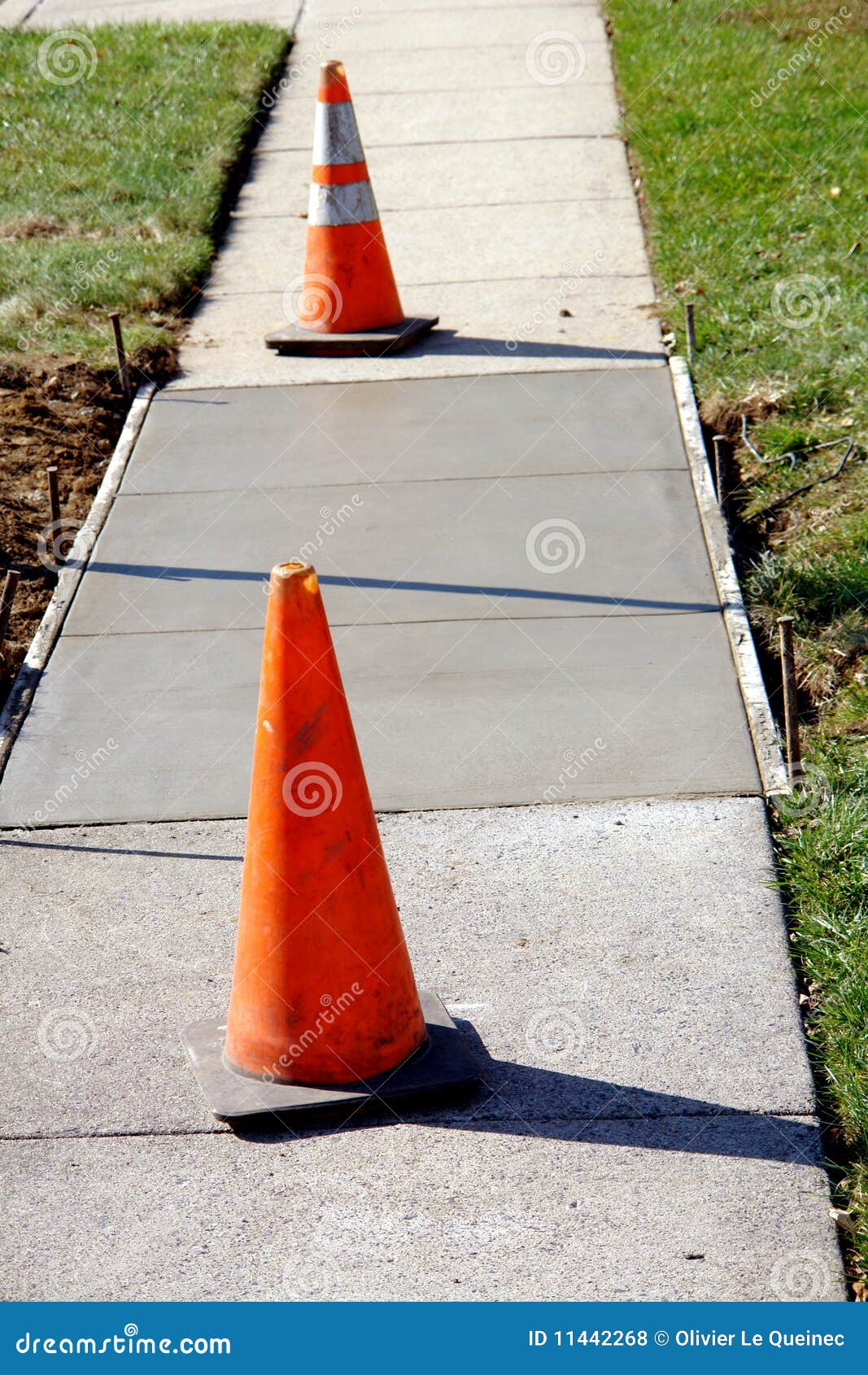 Concrete Sidewalk Repair On City Street With Cones Royalty Free Stock