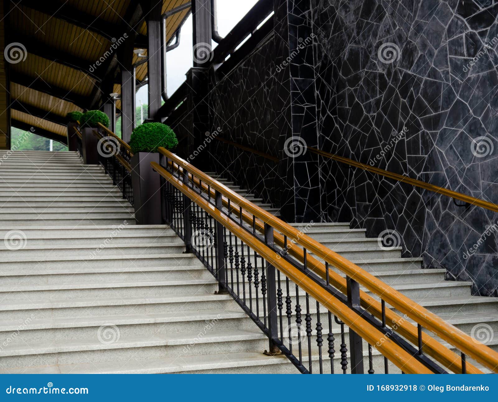 Concrete Staircase with Wooden Railing. Bottom View Editorial Stock ...
