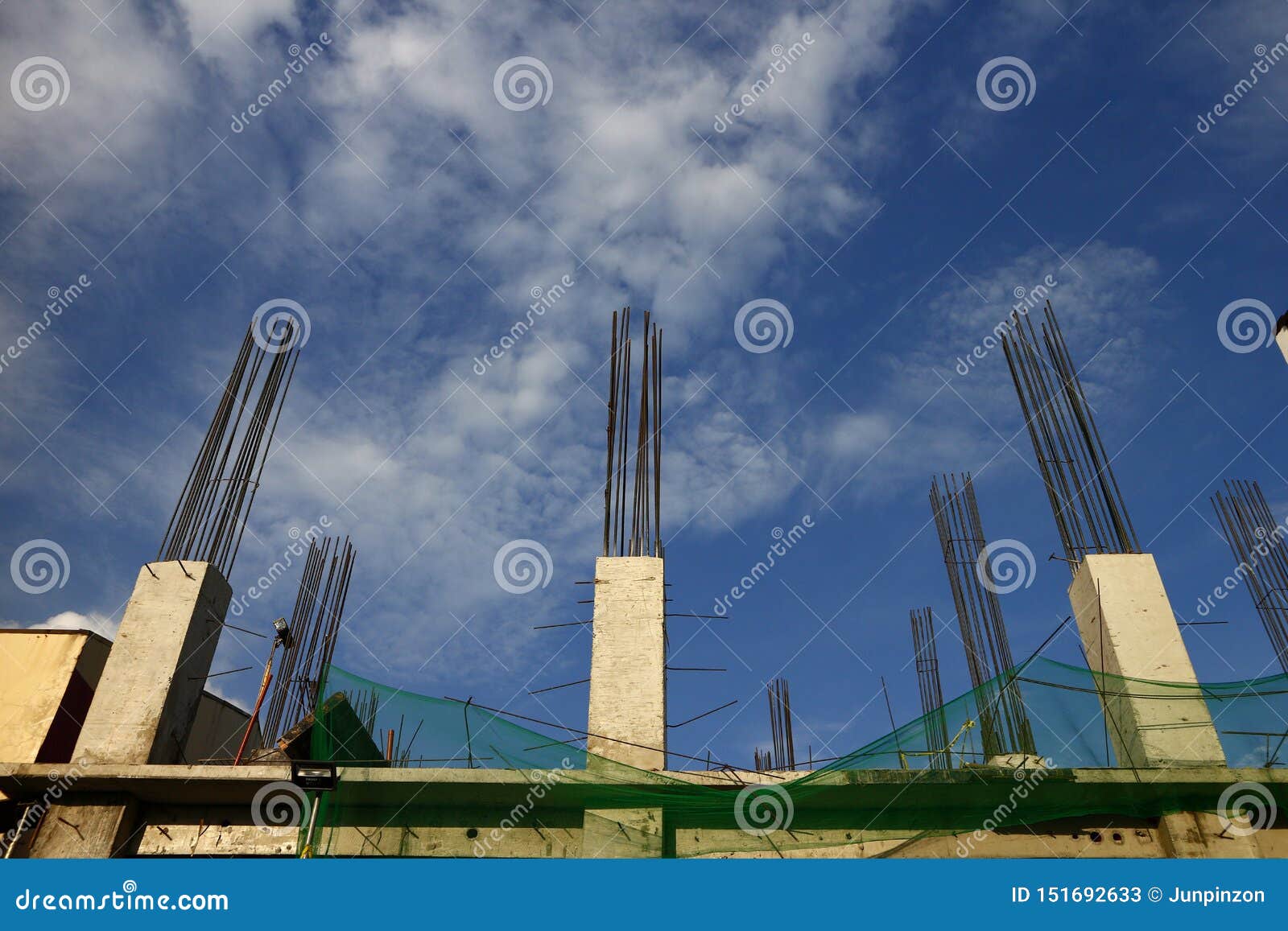 Concrete and Steel Pillars of an Unfinished Building at a Construction ...